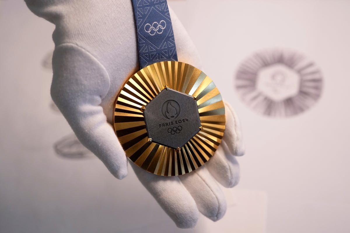 The Paris Olympics medals are made with pieces of the Eiffel Tower ...