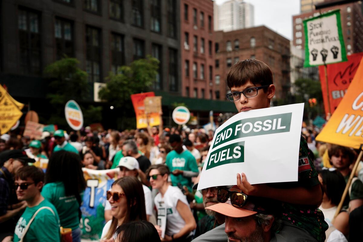 Tens of thousands march to kick off climate summit, demanding end to ...