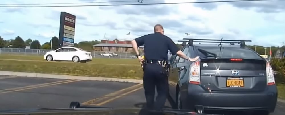 Why do police officers touch the back of stopped cars? | International ...
